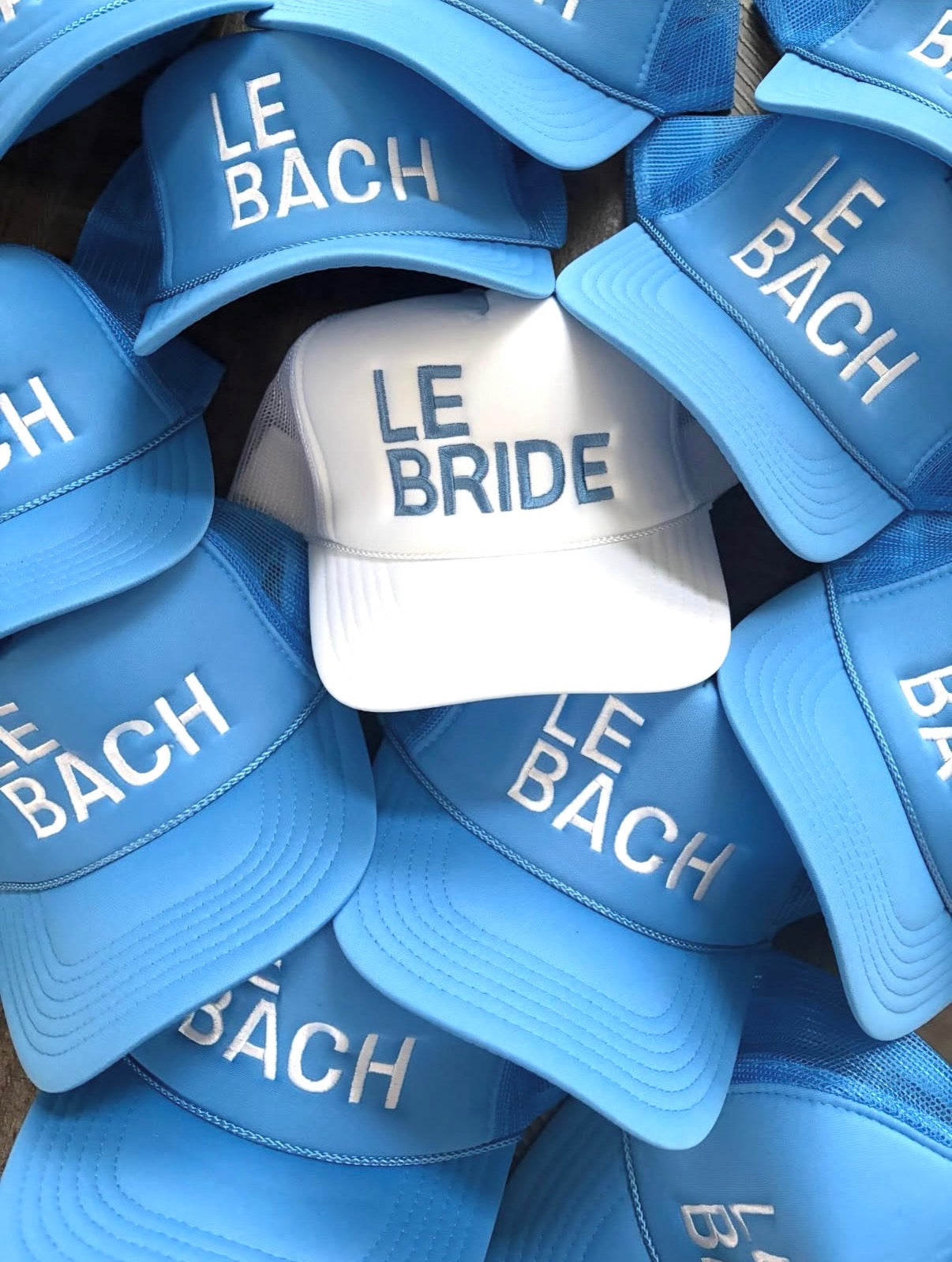 Custom embroidered trucker hats – Threaded Creations